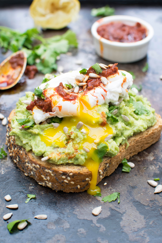 Smashed Avocado Toast with Poached Egg & Harissa [vegetarian]